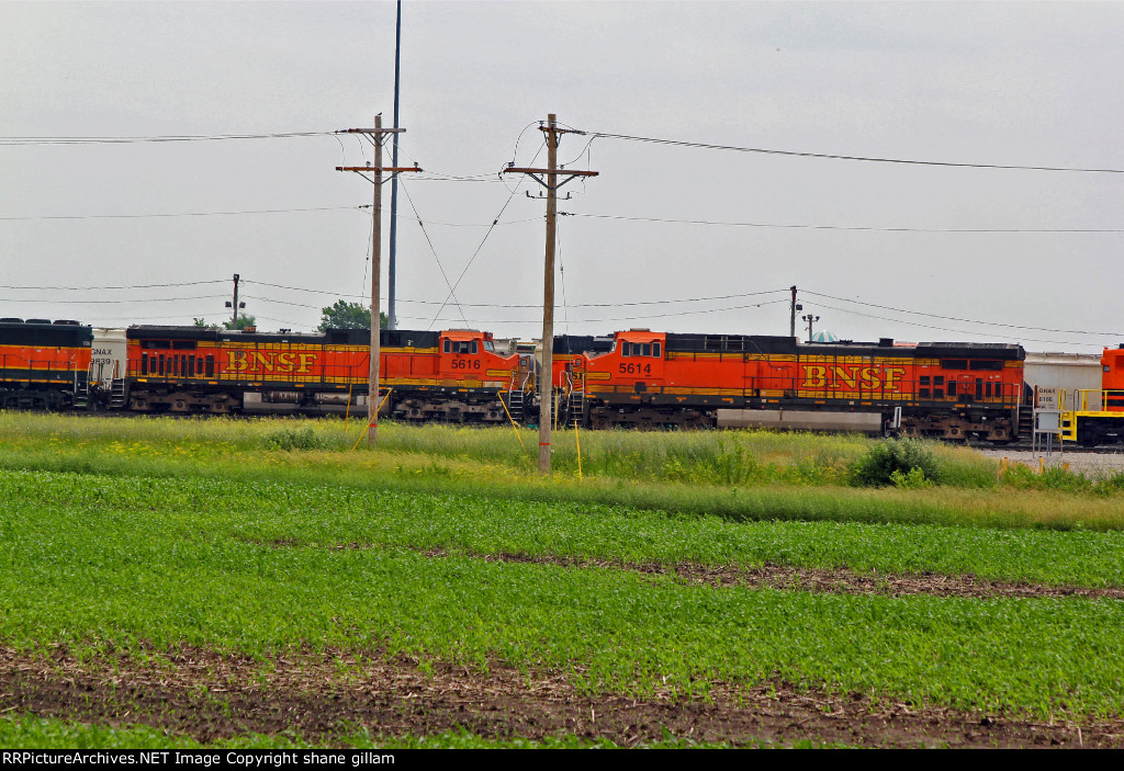BNSF 5614 and Almost sister 5614 sit in the yard.